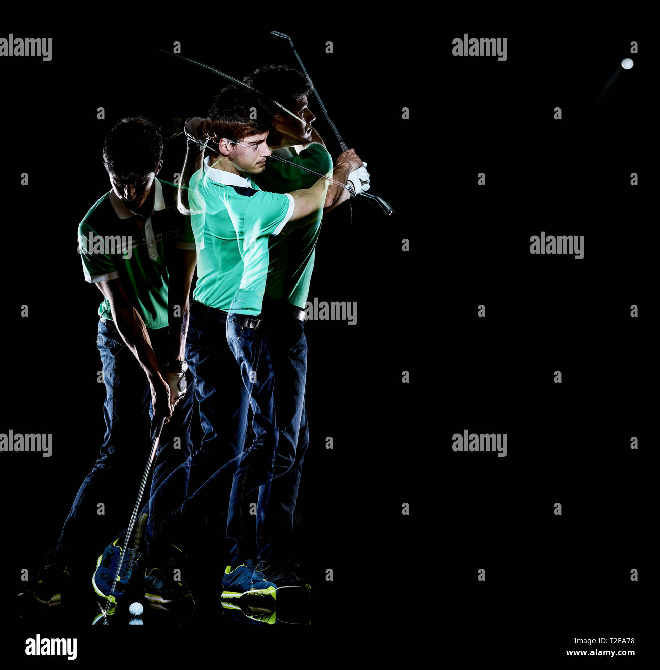 one caucasian young golfer man golfing golf swing isolated on black ...