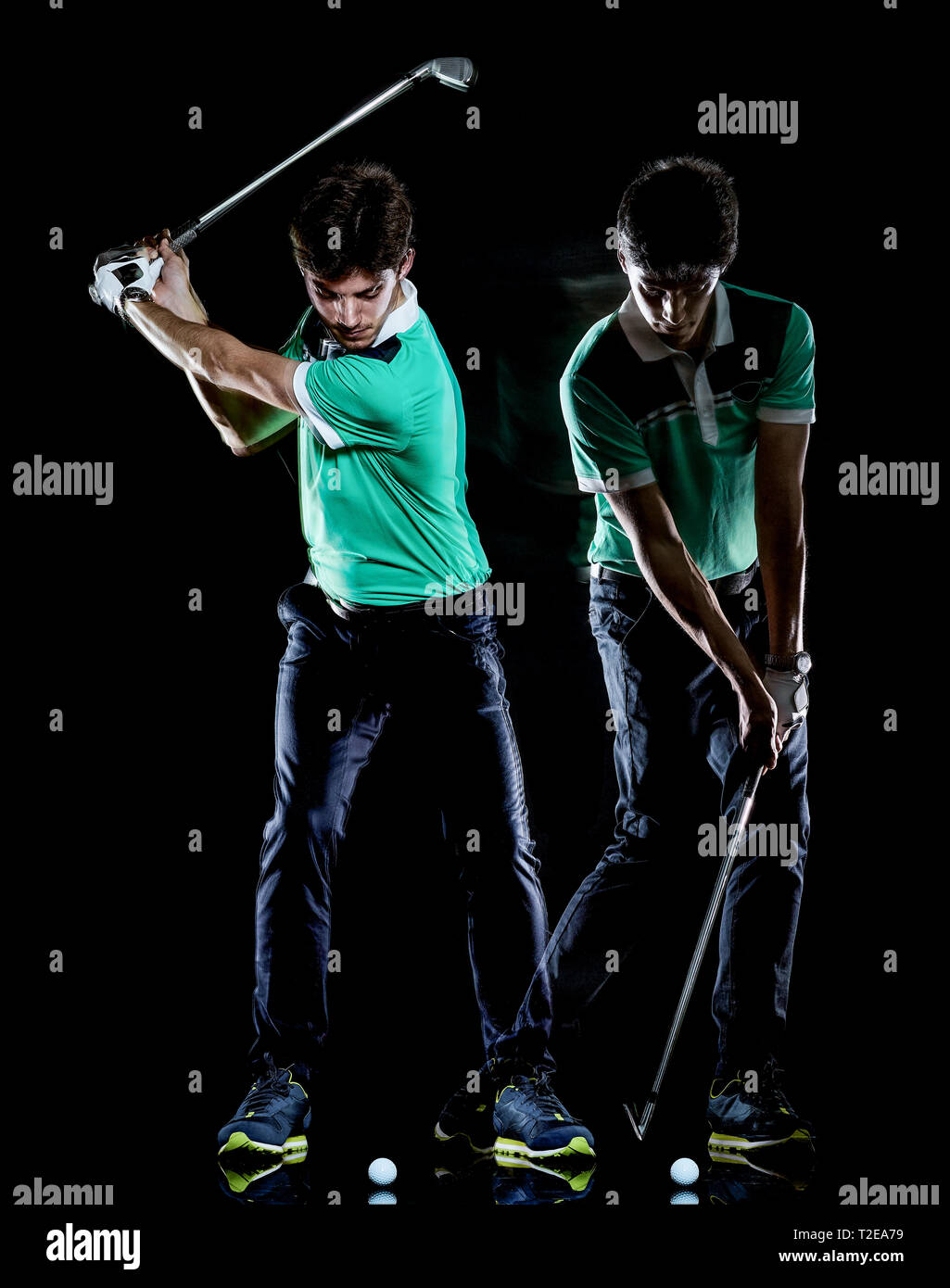 one caucasian young golfer man golfing golf swing isolated on black ...