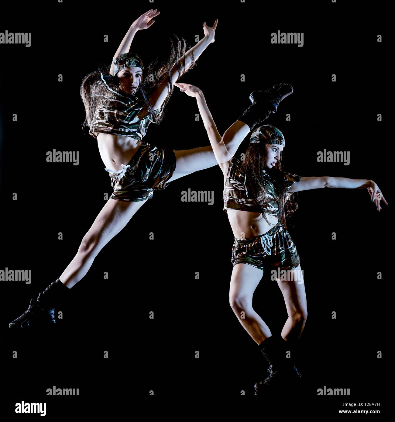 one caucasian young woman modern dancer dancing isolated on black ...