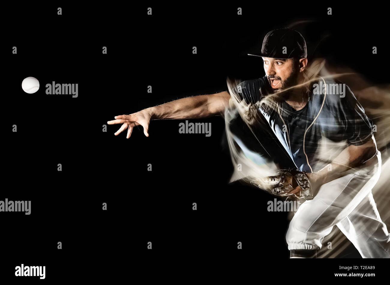one caucasian baseball player man studio shot isolated on black ...