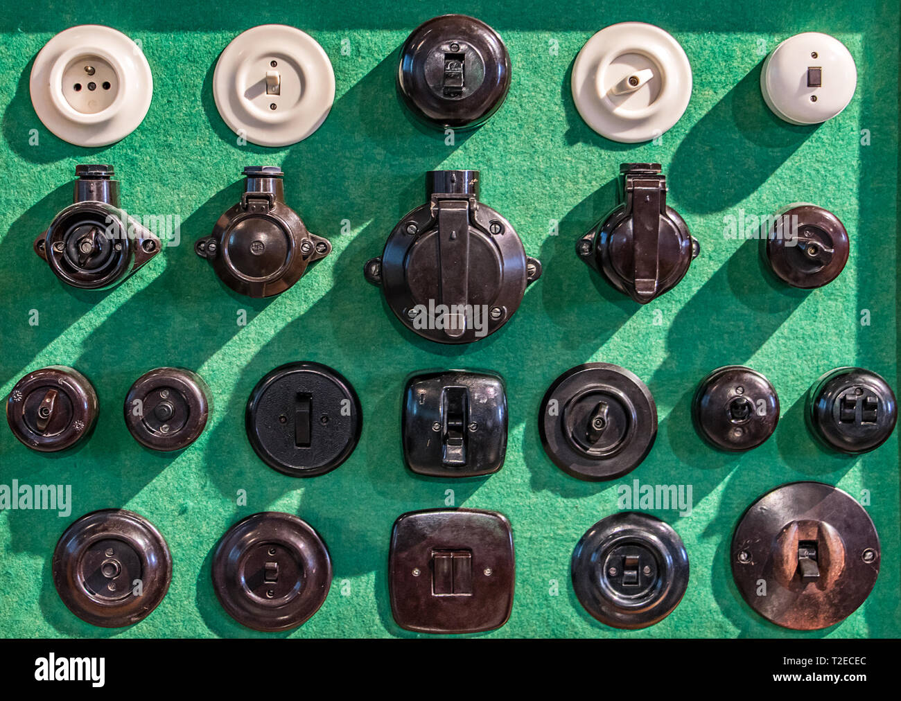 A collection of old electrical sockets and switches Stock Photo - Alamy