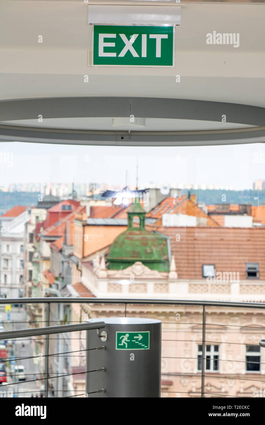 Exit sign hanging on ceiling hi-res stock photography and images - Alamy