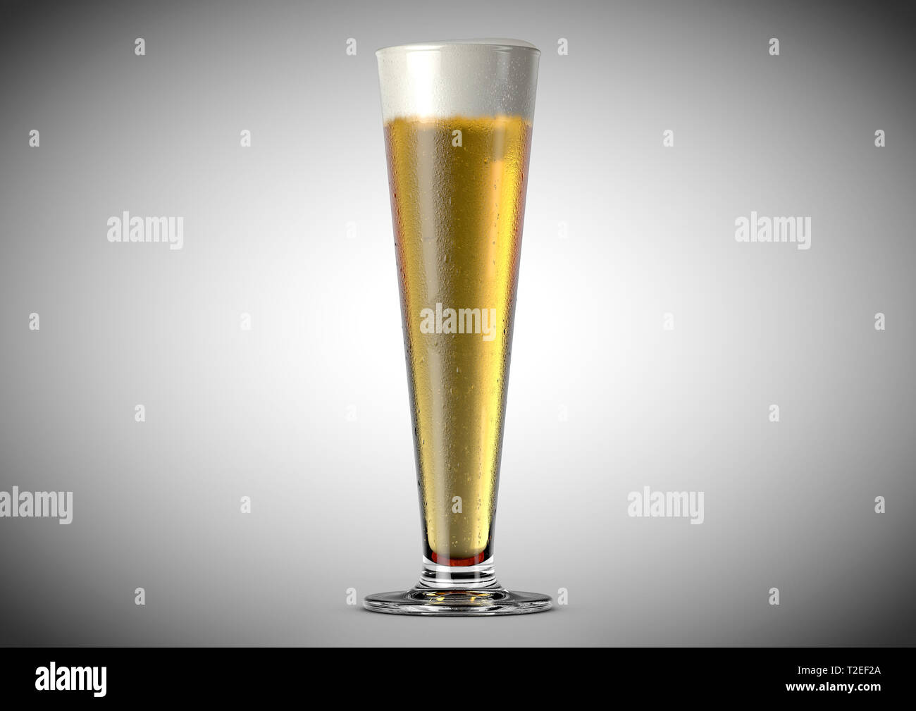 An ice cold pilsner shaped beer glass filled with beer and a head of ...