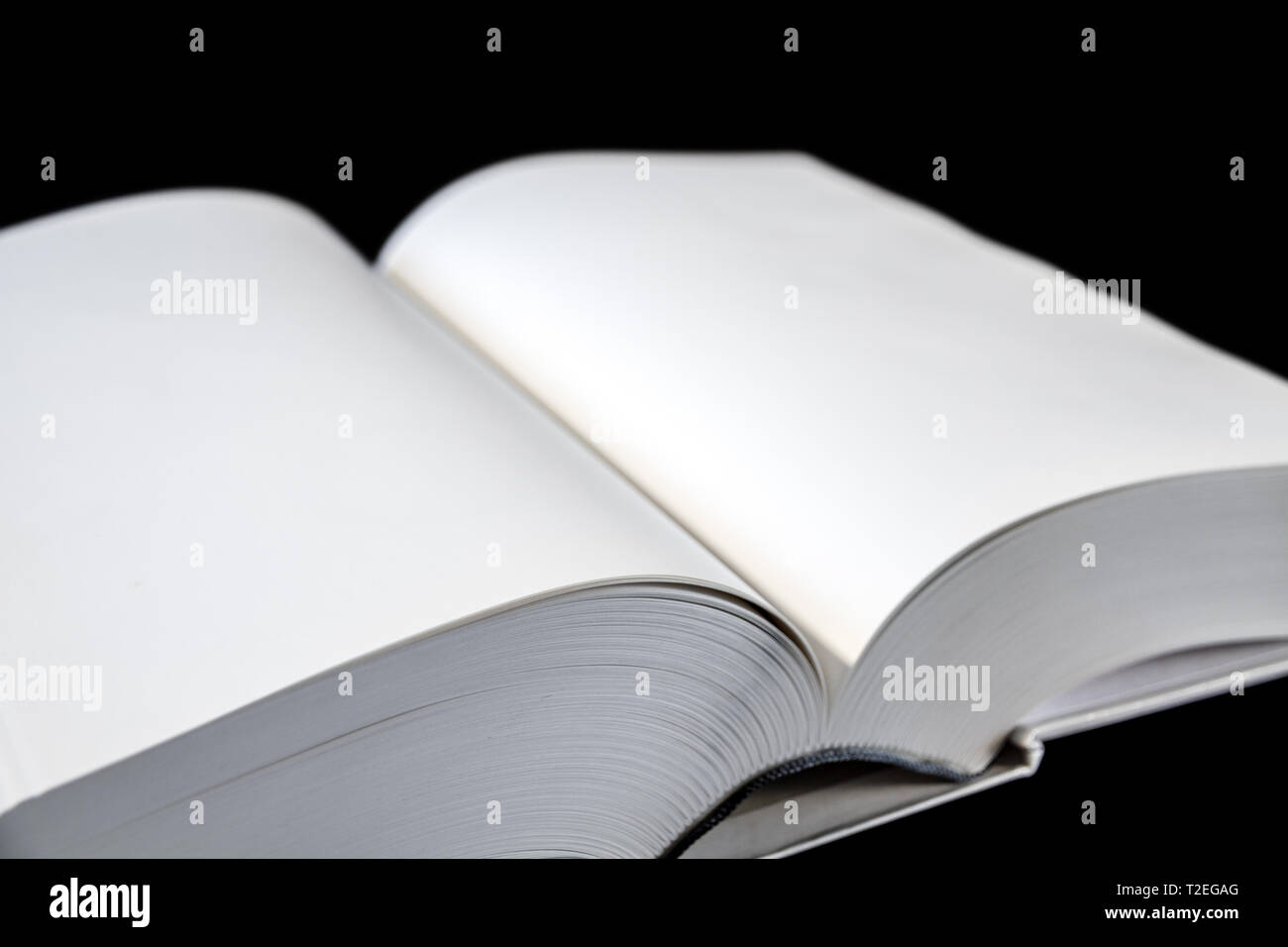 Open blank dictionary, book mockup, black background Stock Photo - Alamy
