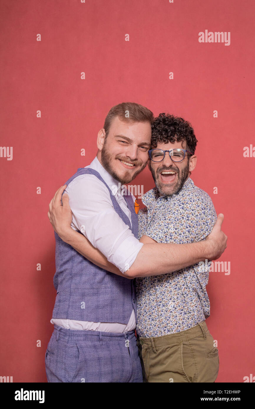 gay men acting silly, making a face, hugging together. photo-shoot in ...