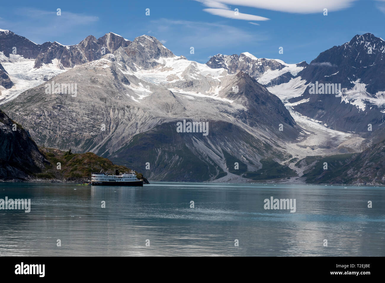 SS Legacy in front of a glacier in Glacier Bay National Park, Alaska ...