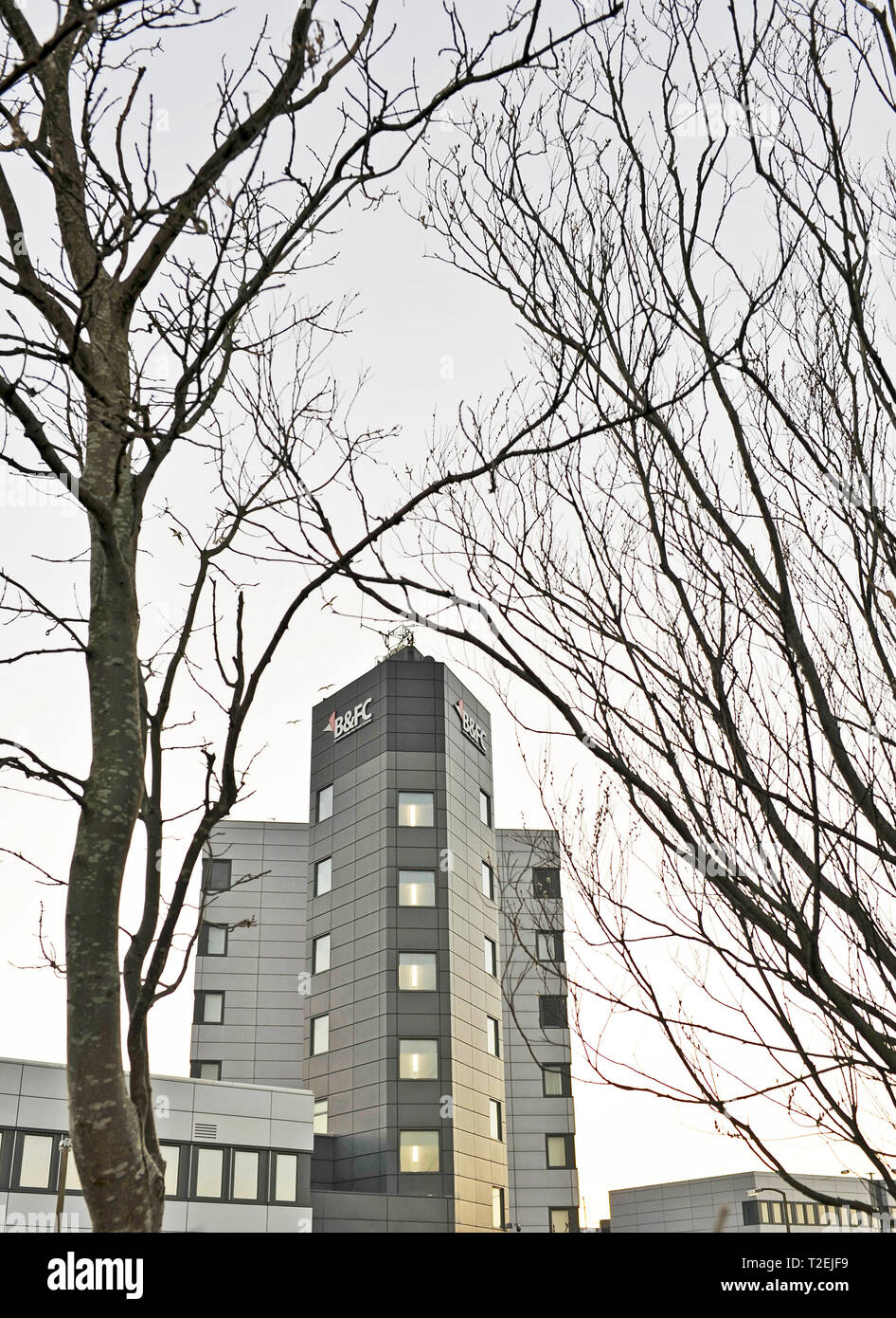 Blackpool and Fylde College campus at Bispham framed by winter trees at ...