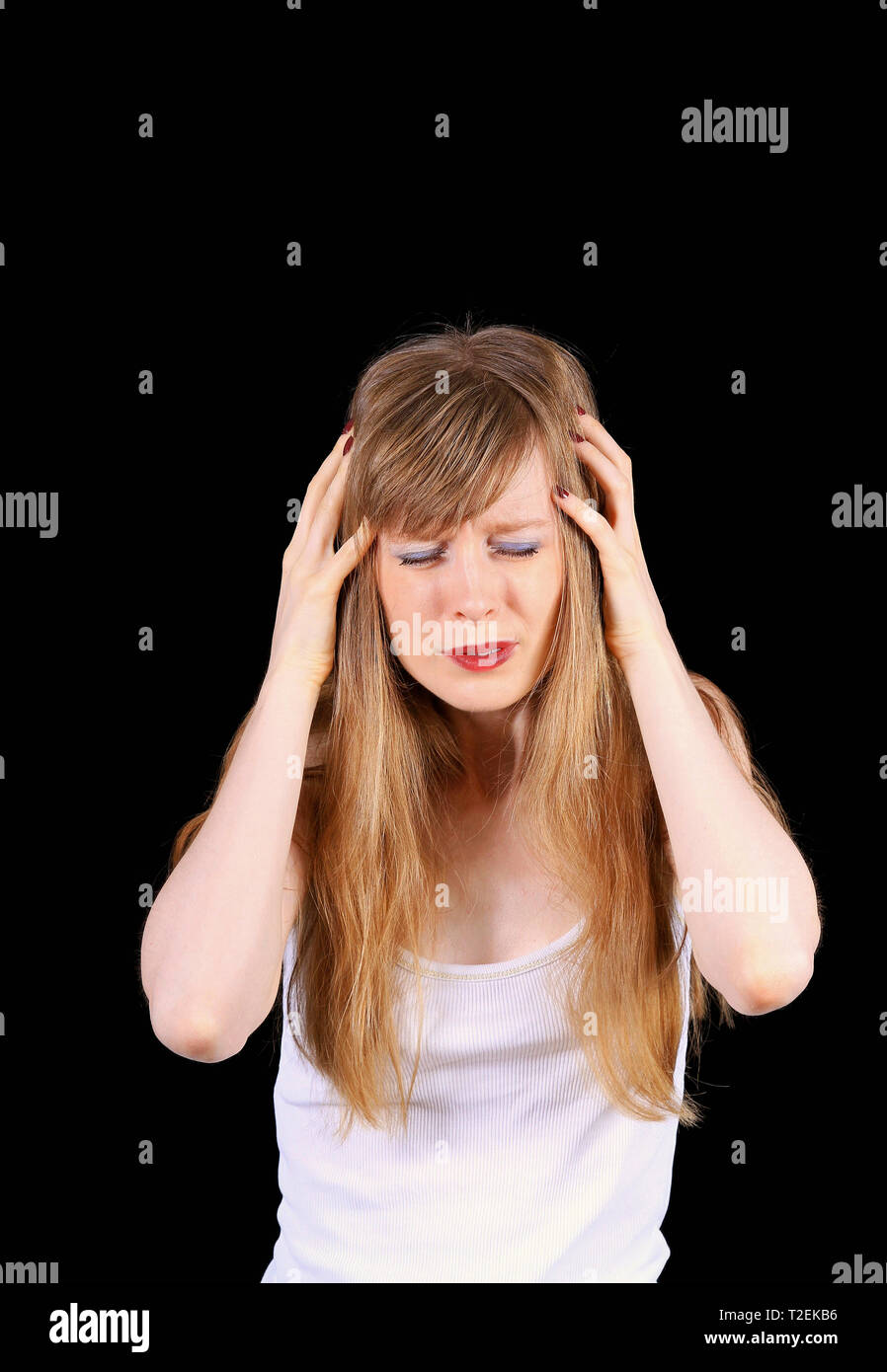 Devastated young women struggling with headache pain Stock Photo - Alamy