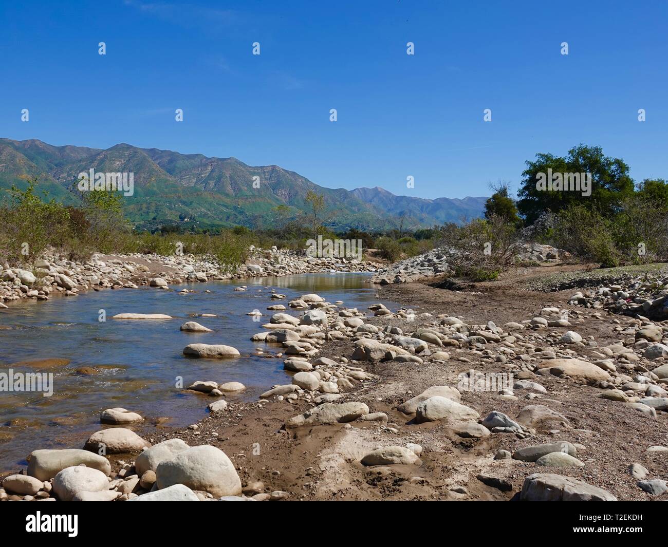 Landscape looking across the rocky Ventura River bed towards the ...