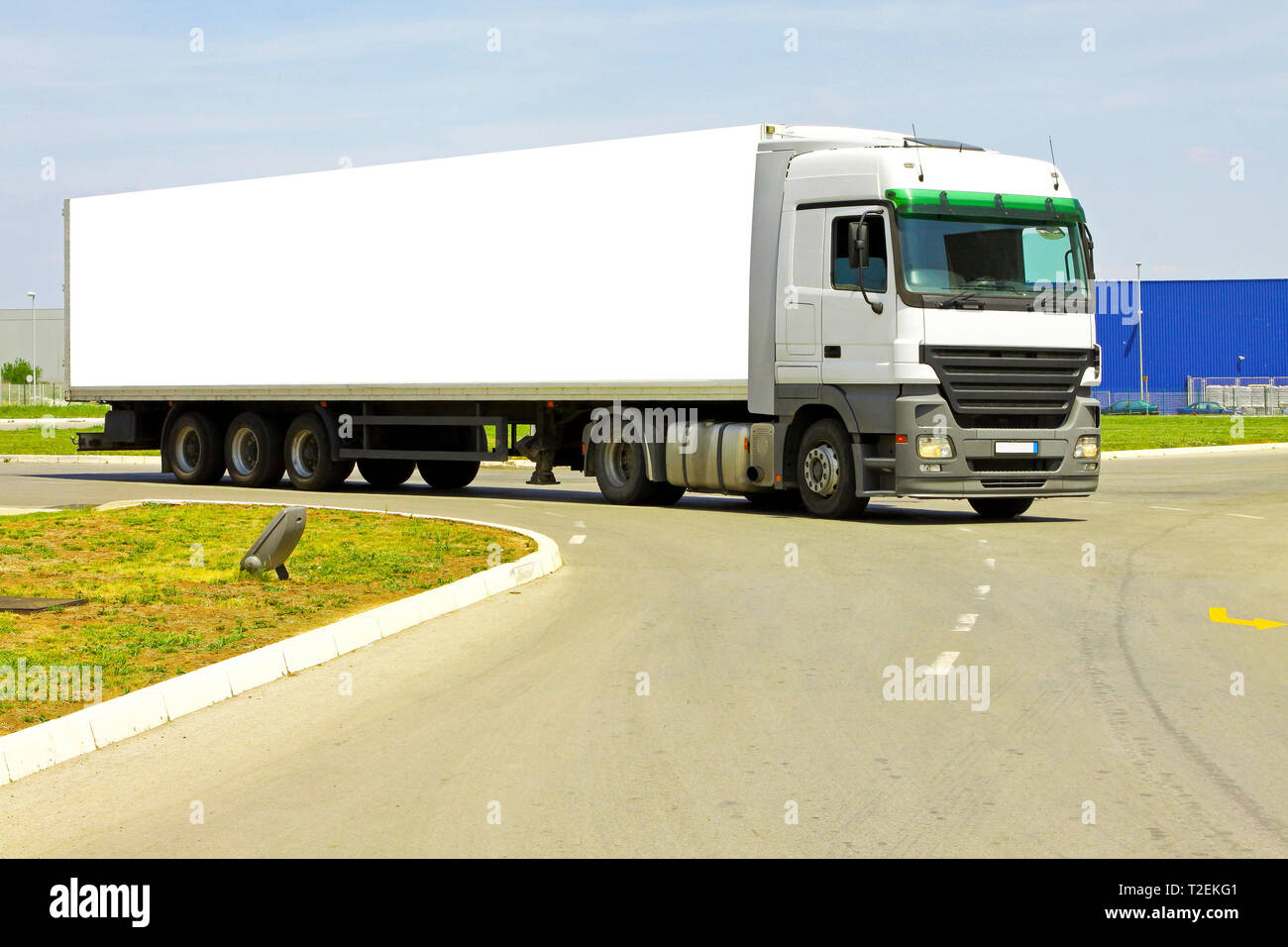 Side view of long white semi lorry Stock Photo - Alamy
