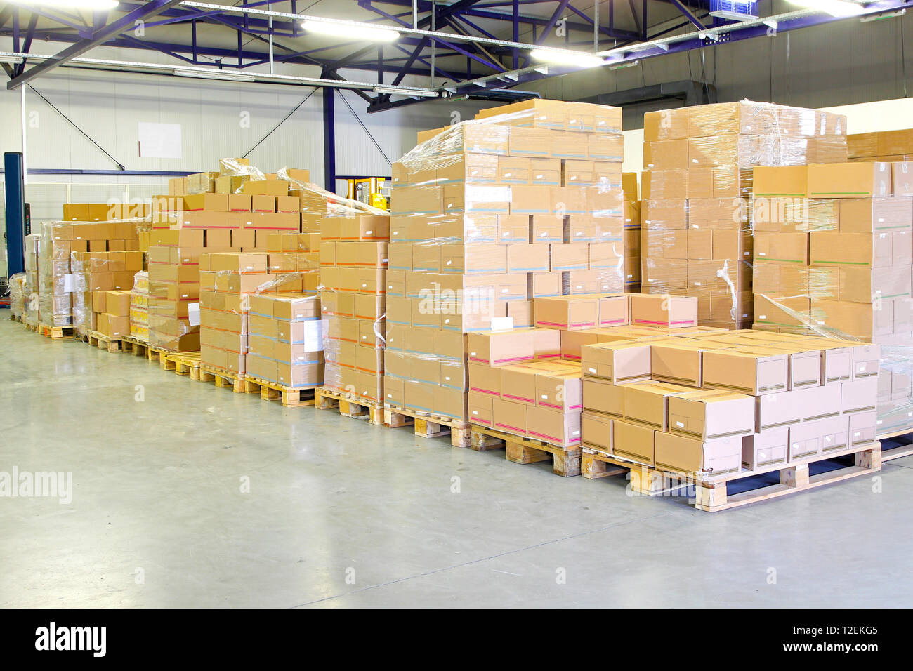 Big pile of box package in warehouse Stock Photo - Alamy
