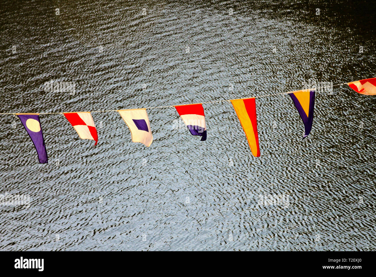 Bunch of decorative naval flags at rope Stock Photo - Alamy
