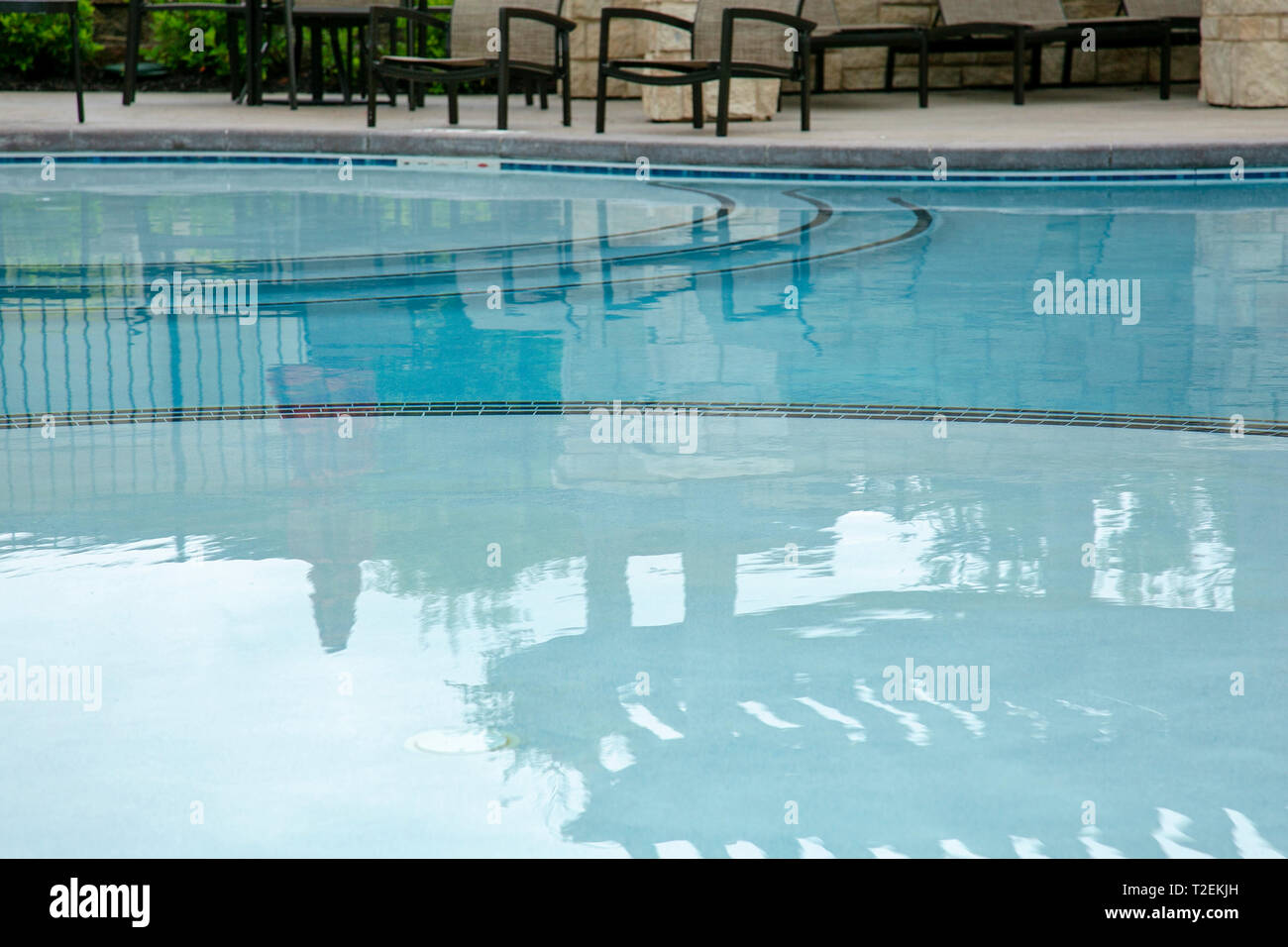 Partial pool with flat reflective water Stock Photo - Alamy
