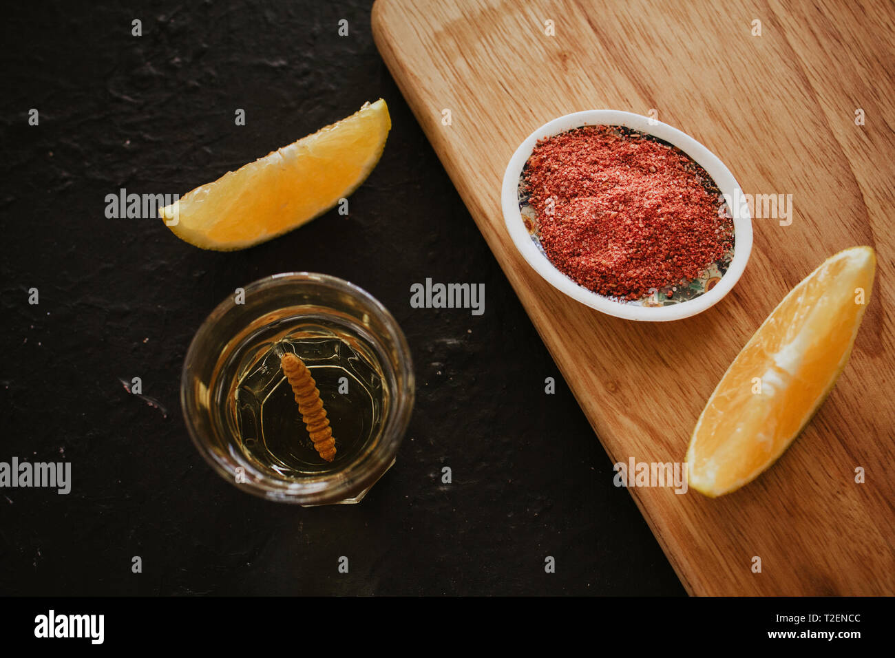 mezcal shot with chili salt and agave worm, mexican drink in mexico ...
