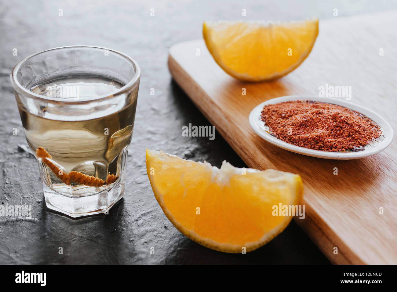 mezcal shot with chili salt and agave worm, mexican drink in mexico ...