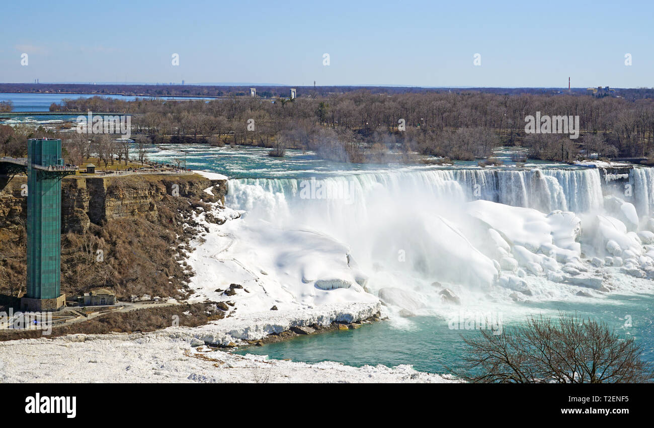 View of the American Falls in Niagara Falls in winter with frozen ice ...