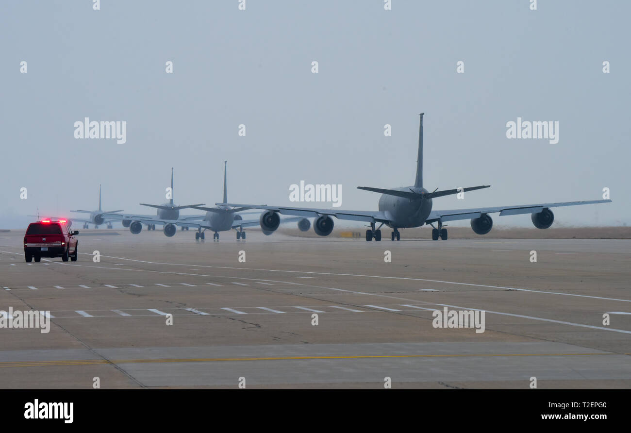 Four KC-135 Stratotankers taxi to the runway as part of a readiness ...