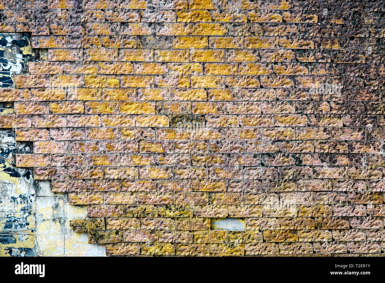 brick wall is crack and break and corroded by rainwater and temperature ...