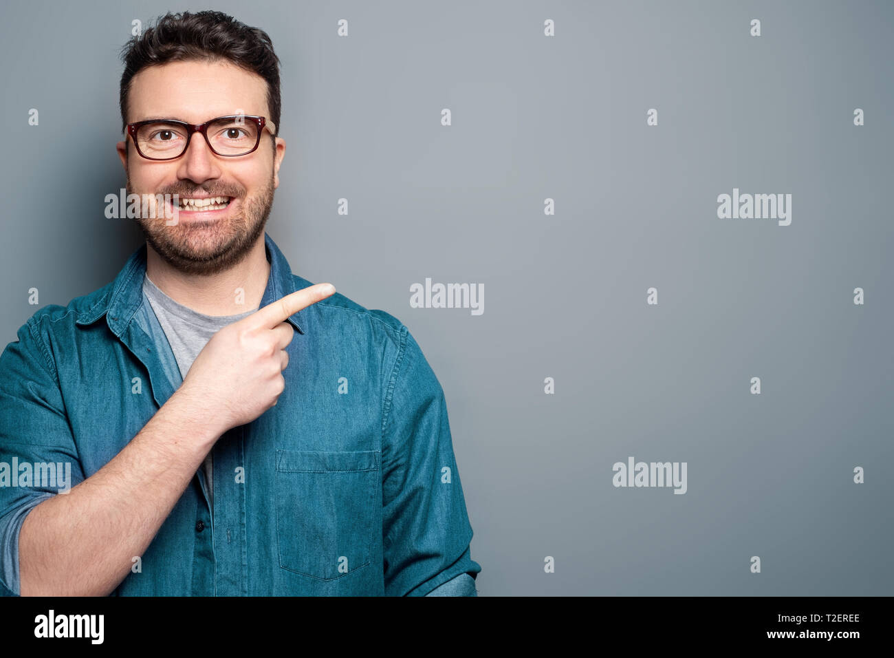 Pointing away confident hi-res stock photography and images - Alamy