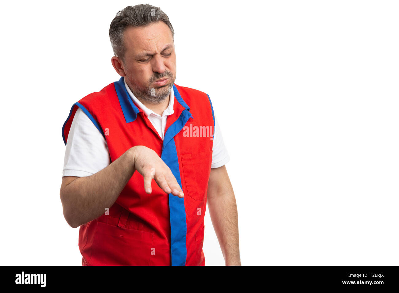 Man working at hypermarket or supermarket with relieved expression ...
