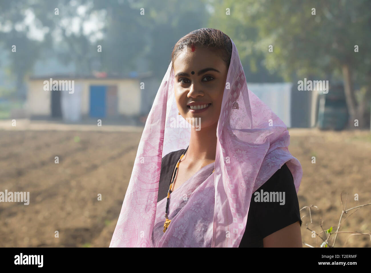 Village woman in saree hi-res stock photography and images - Alamy