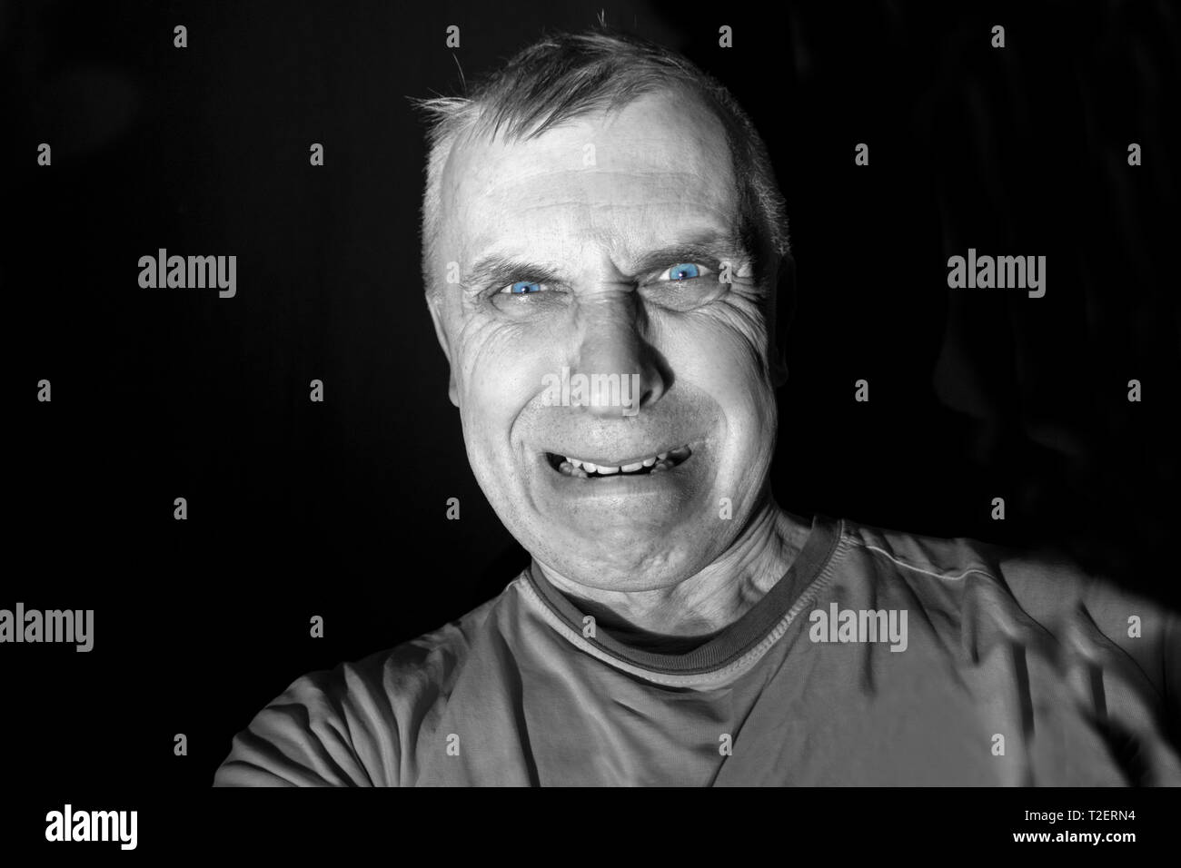 Studio portrait of emotionally disturbed person, selective color Stock ...