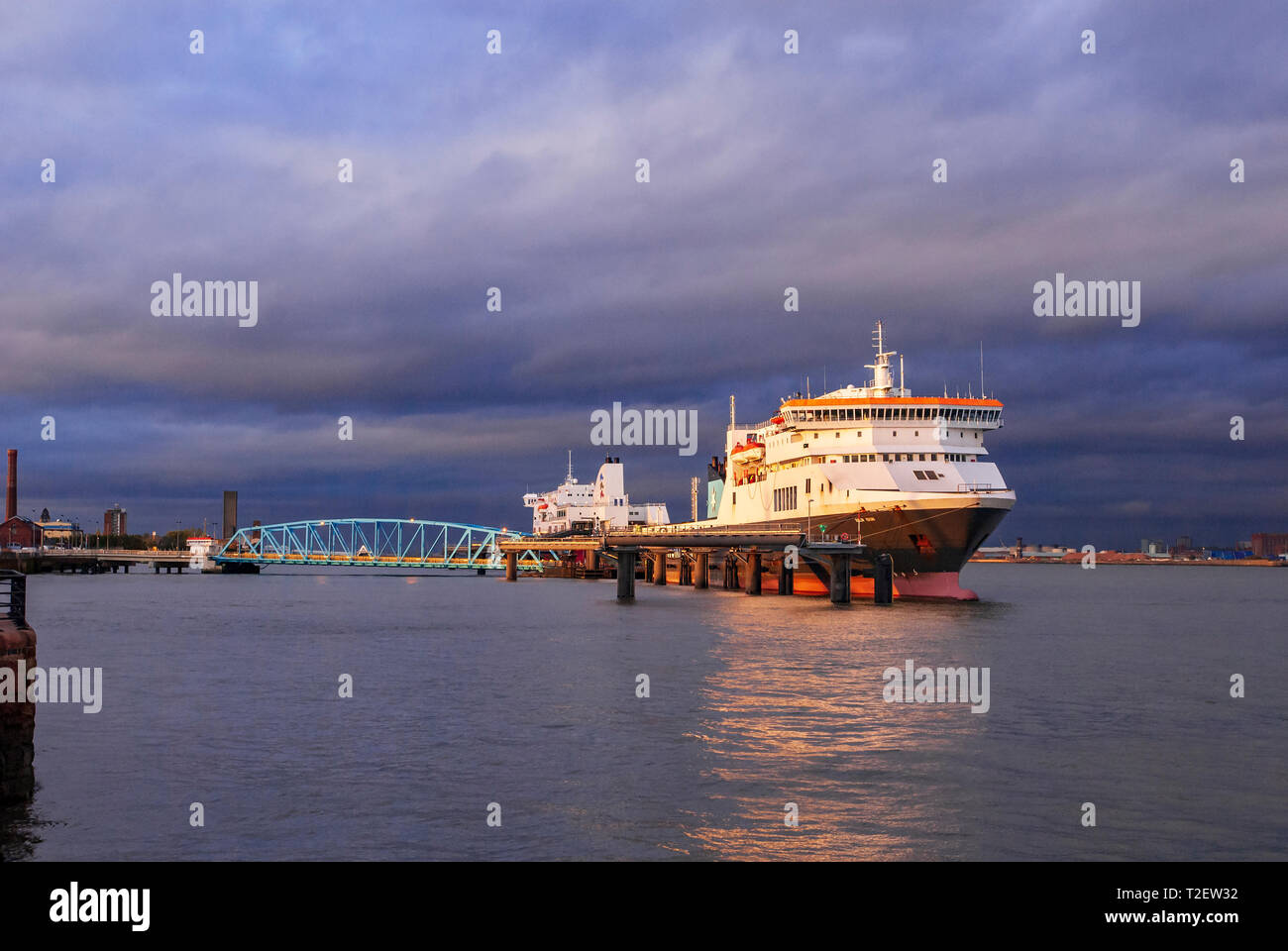The 12 Quays ferry terminal at Birkenhead bathed in golden early ...