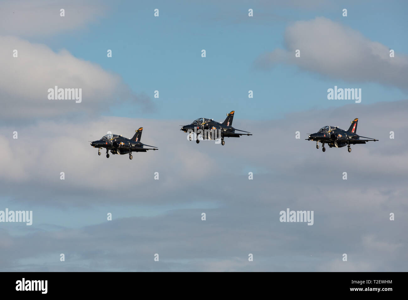 3 RAF T2 Hawk training planes, Fly over runway in close formation Stock ...