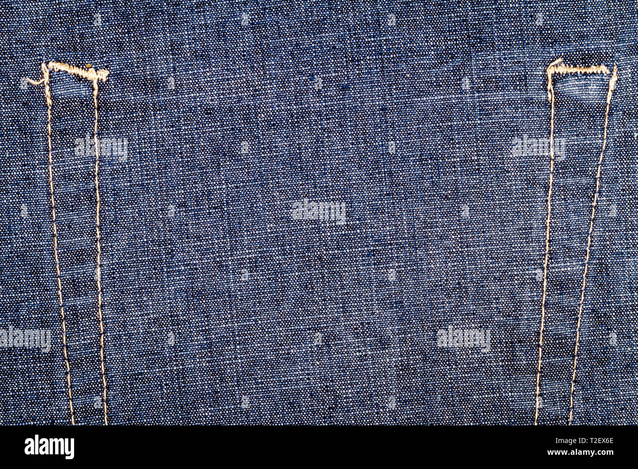 Wrong side of jeans fabric with back seam Stock Photo - Alamy
