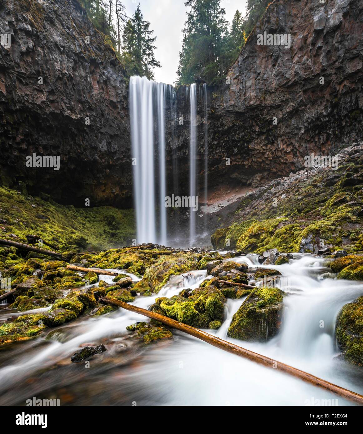 Waterfall flows over rocky outcrop, long term exposure, River Cold ...