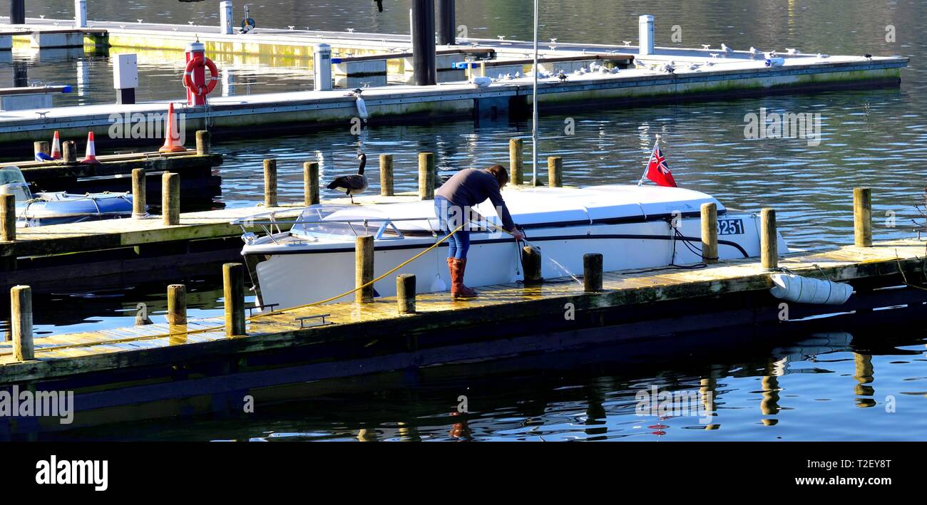 Boat jetty being hosed down hi-res stock photography and images - Alamy