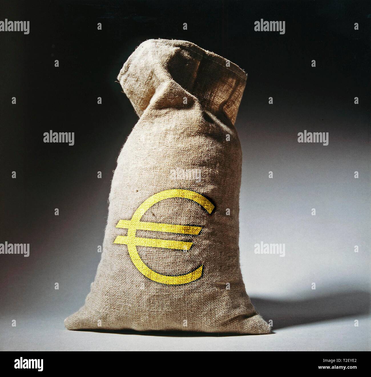 Filled moneybag made of jute with euro sign, Germany Stock Photo - Alamy