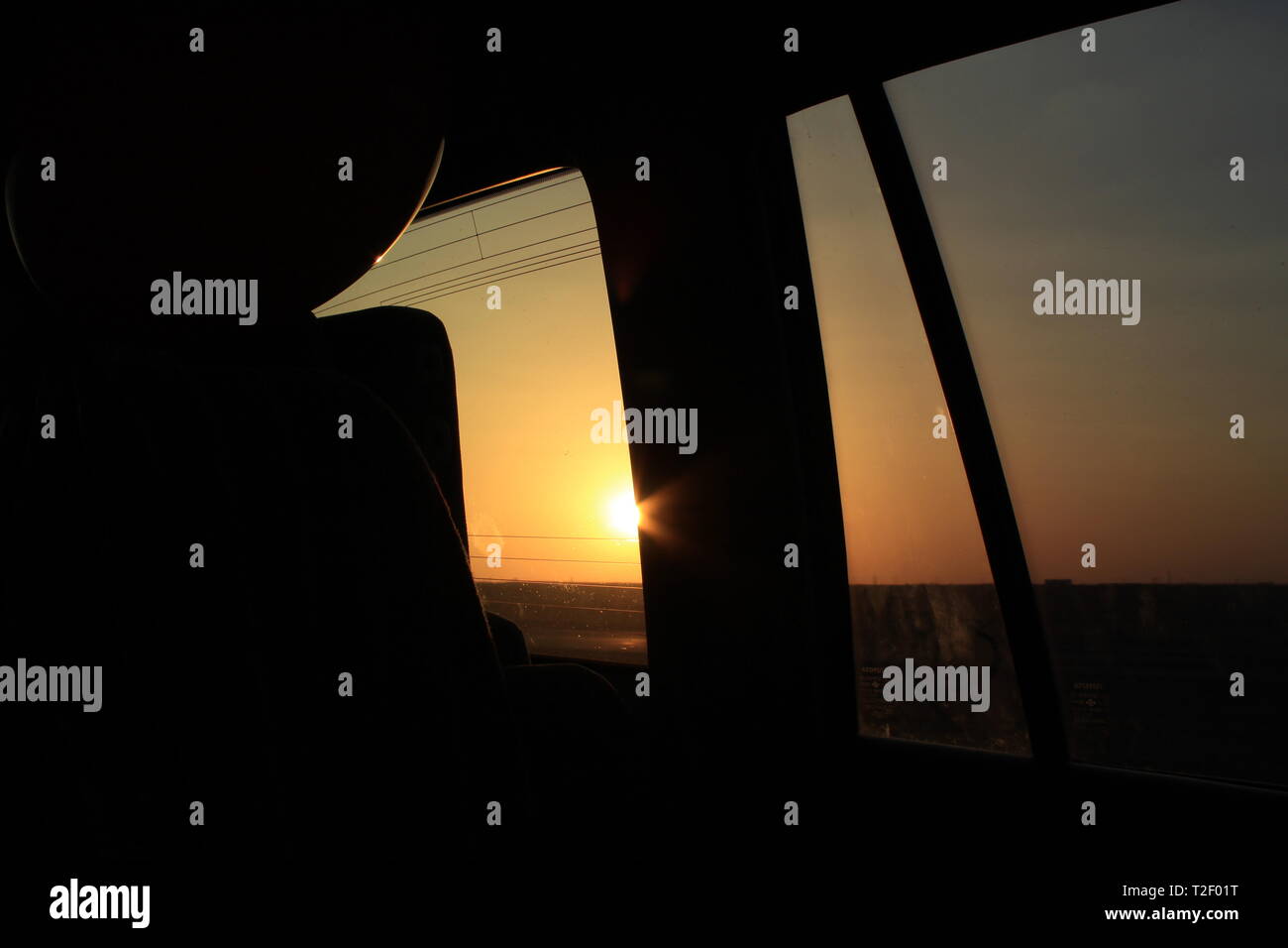 Sunset View from Car through Window in a Desert Stock Photo - Alamy