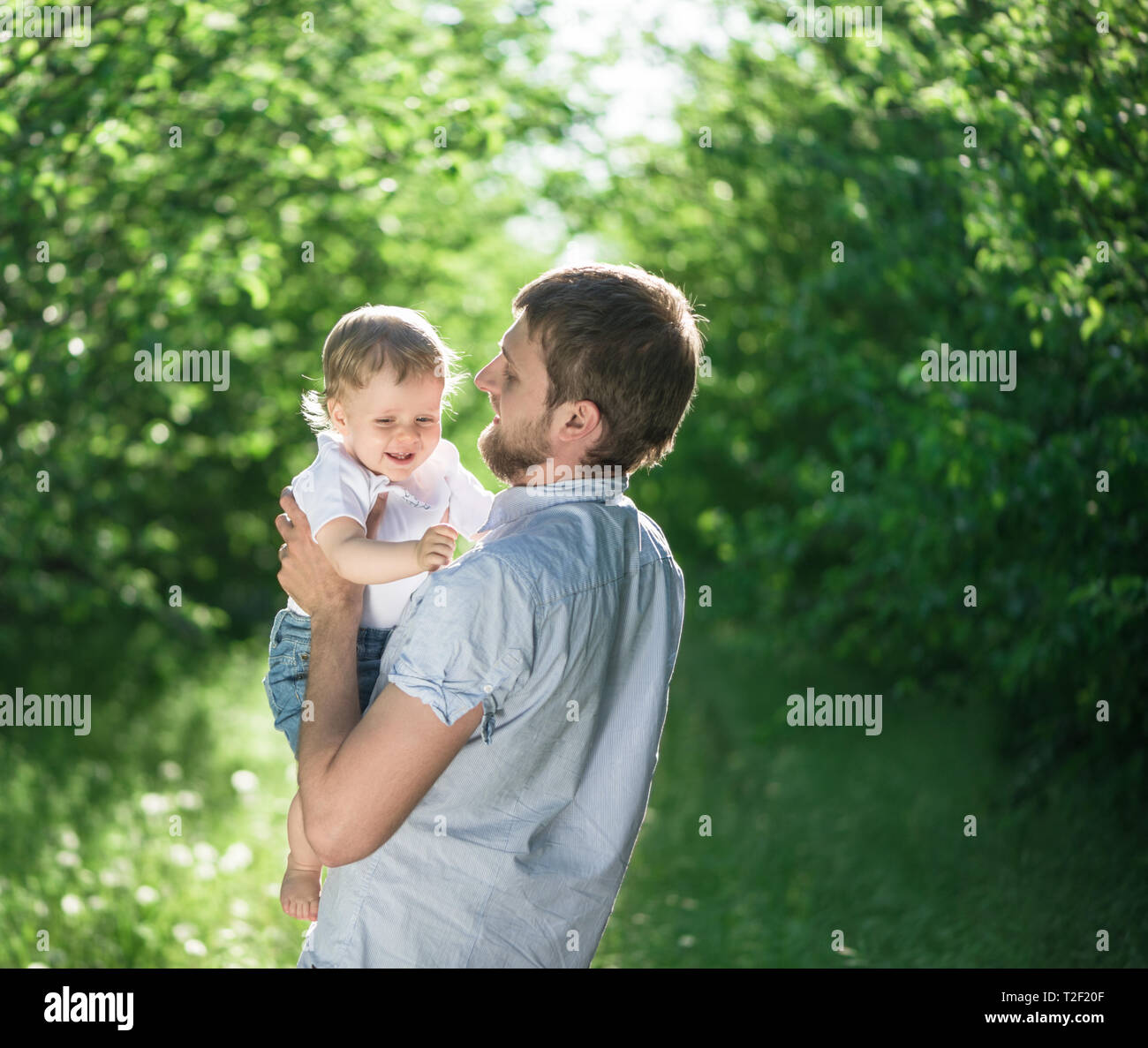 Happy father son garden hi-res stock photography and images - Alamy