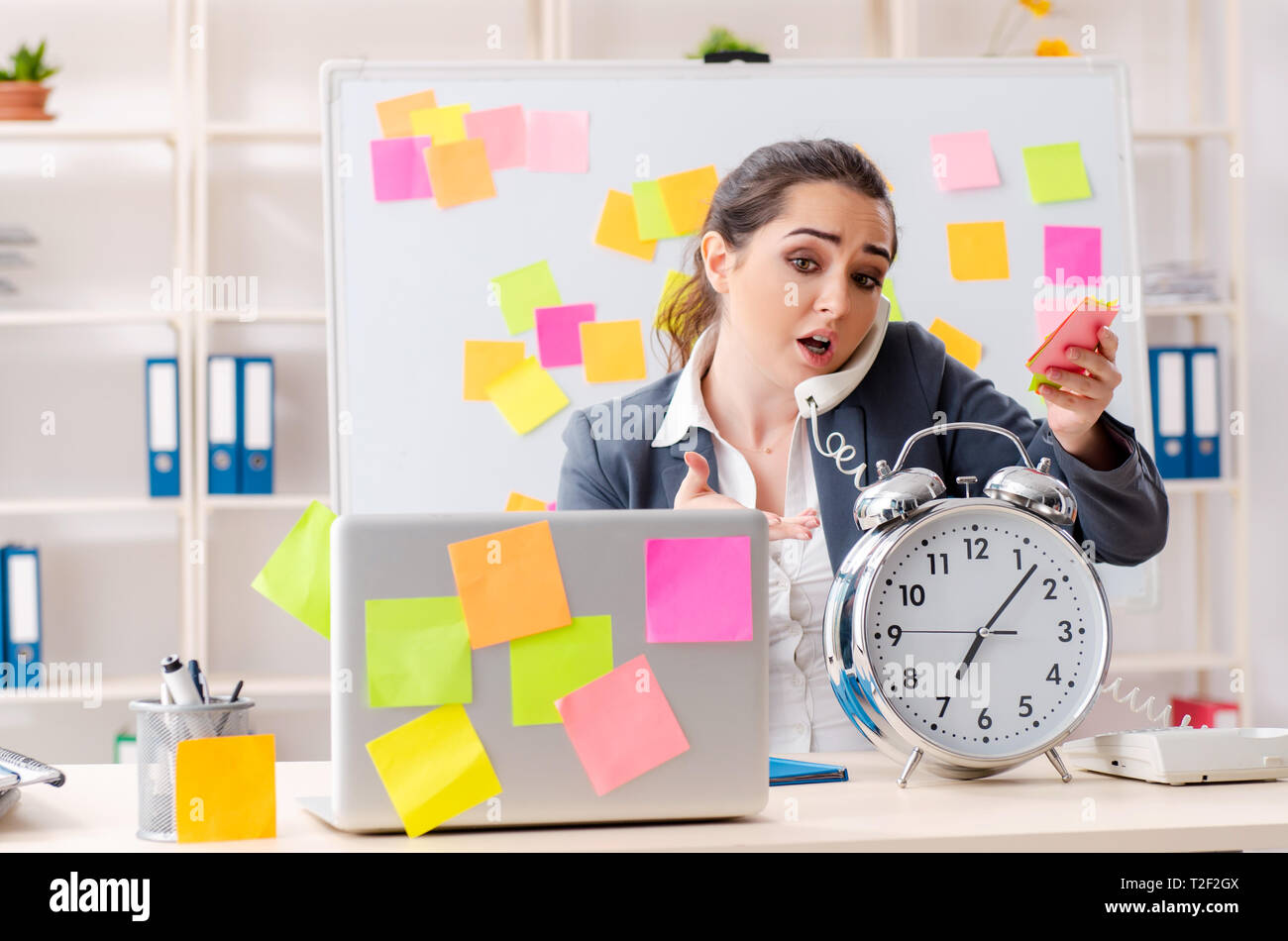 Clock balancing concept woman hi-res stock photography and images - Alamy