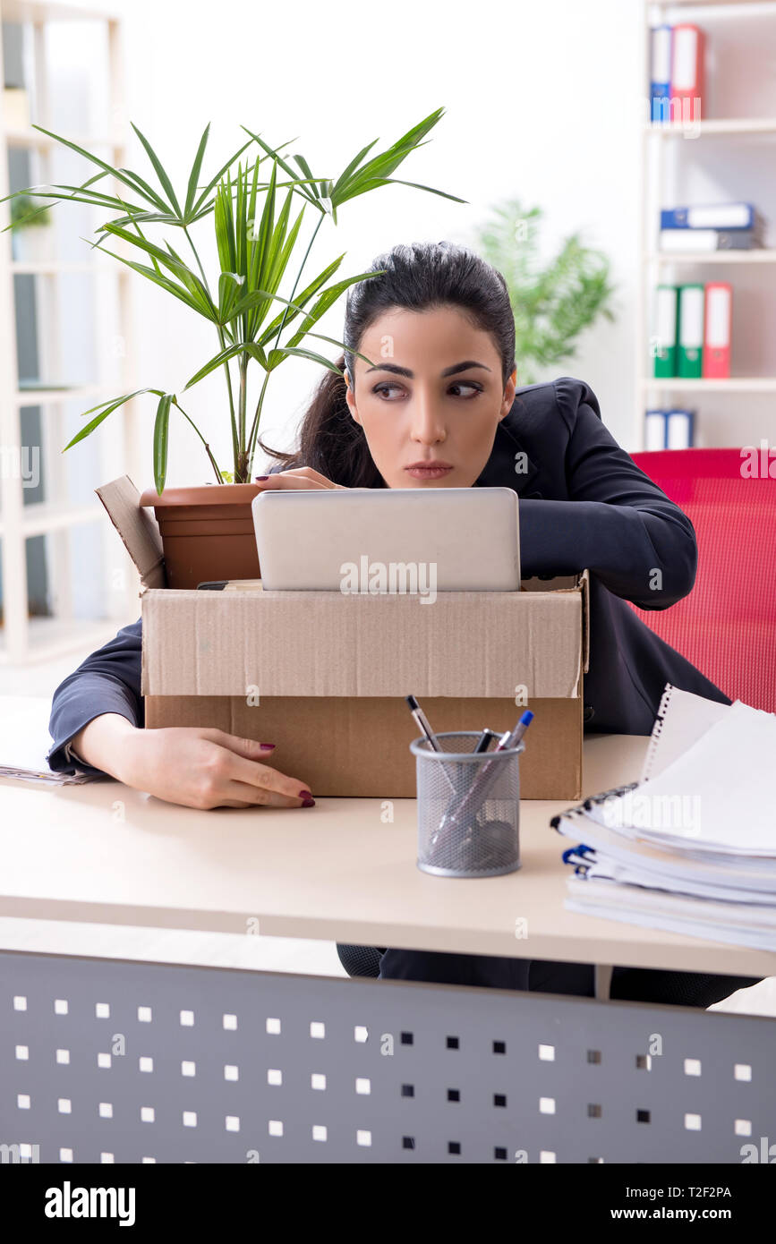 Young female employee being fired from her work Stock Photo - Alamy