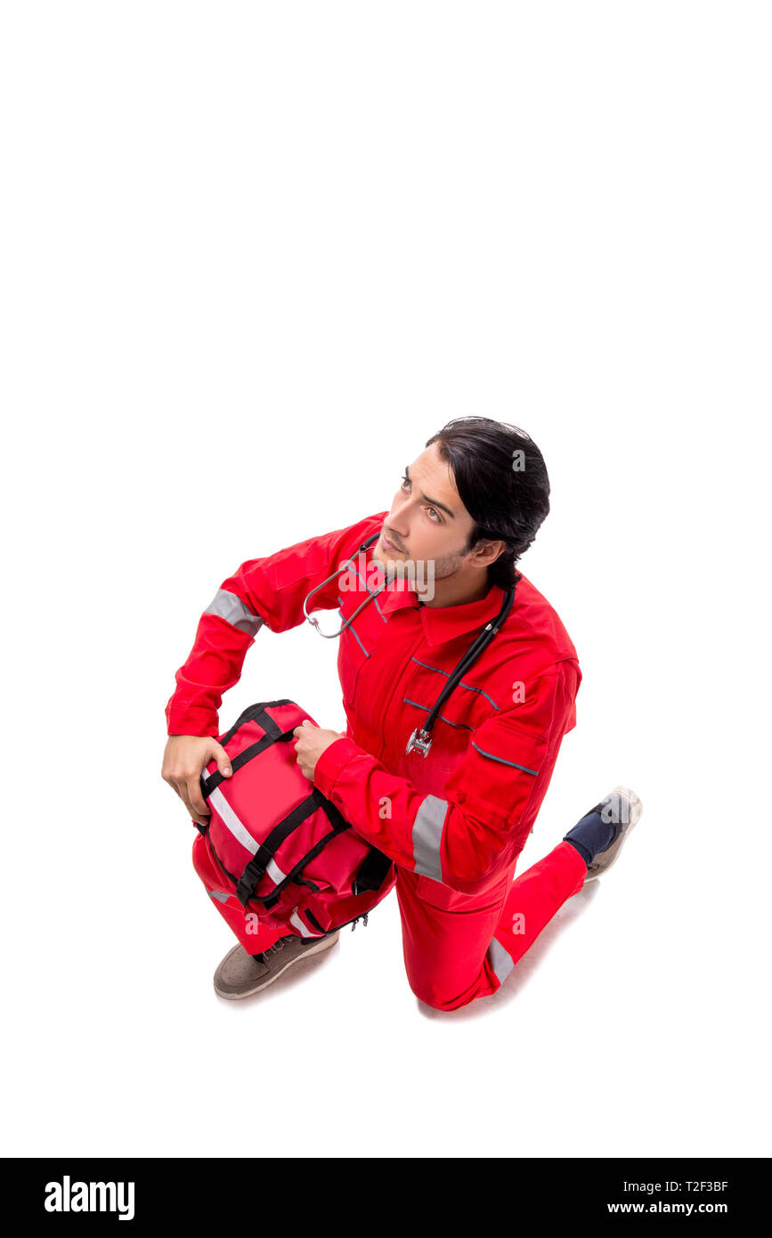 Young paramedic in red uniform isolated on white Stock Photo - Alamy