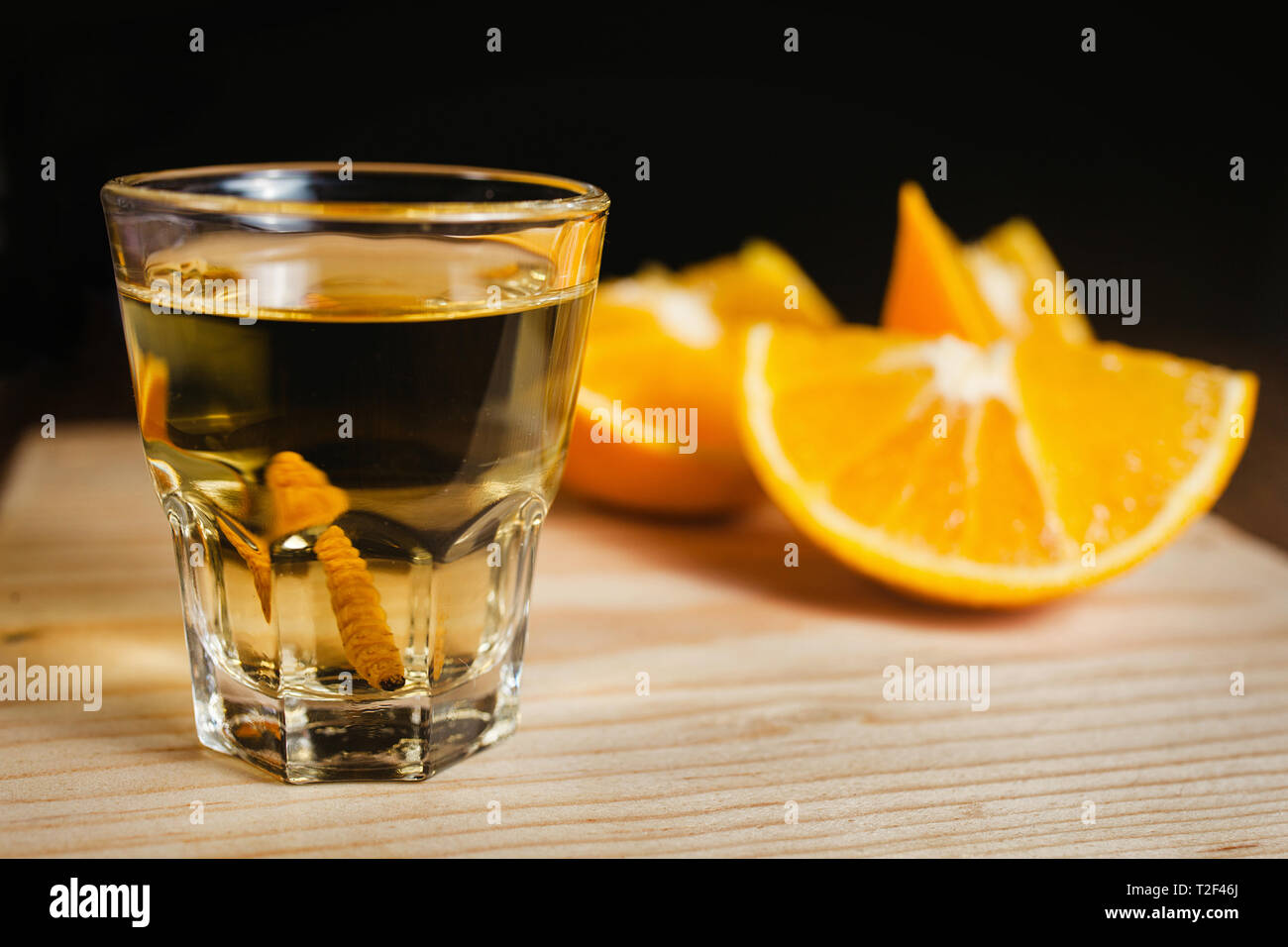 Mezcal shot with chili, salt agave worm, mexican drink in Oaxaca Mexico ...