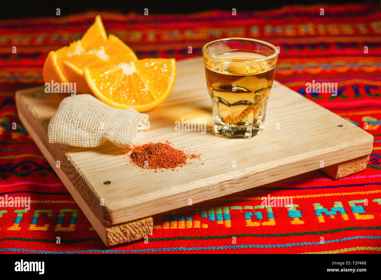 Mezcal shot with chili, salt agave worm, mexican drink in Oaxaca Mexico ...