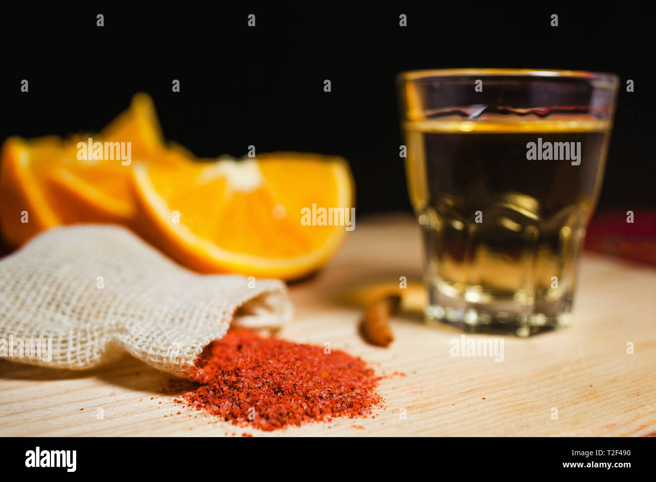 Mezcal shot with chili, salt agave worm, mexican drink in Oaxaca Mexico ...