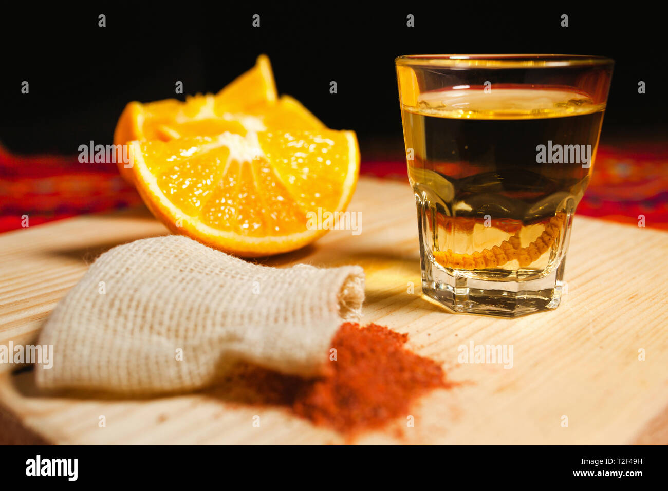 Mezcal shot with chili, salt agave worm, mexican drink in Oaxaca Mexico ...