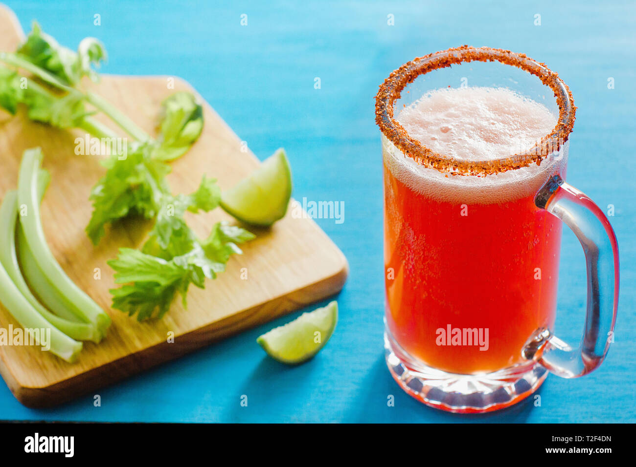 Michelada is beer with tomato juice, spicy sauce and lemon, mexican ...