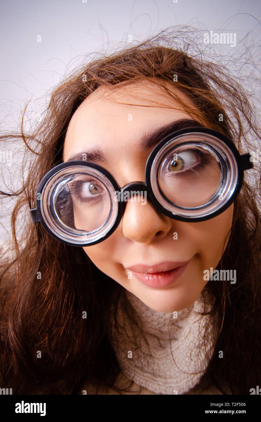 Funny nerd girl working on computer Stock Photo - Alamy
