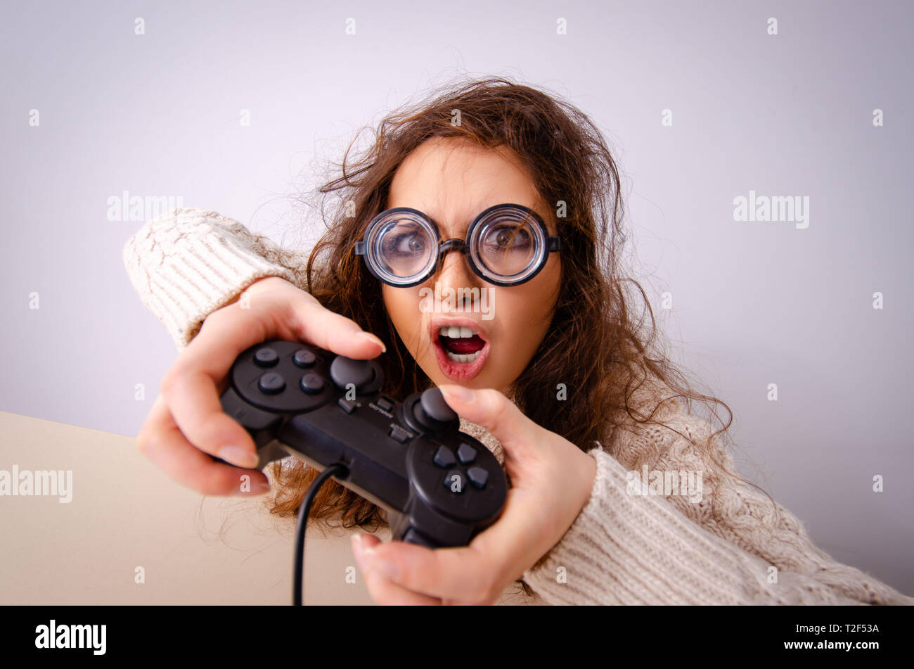 Funny nerd girl working on computer Stock Photo - Alamy