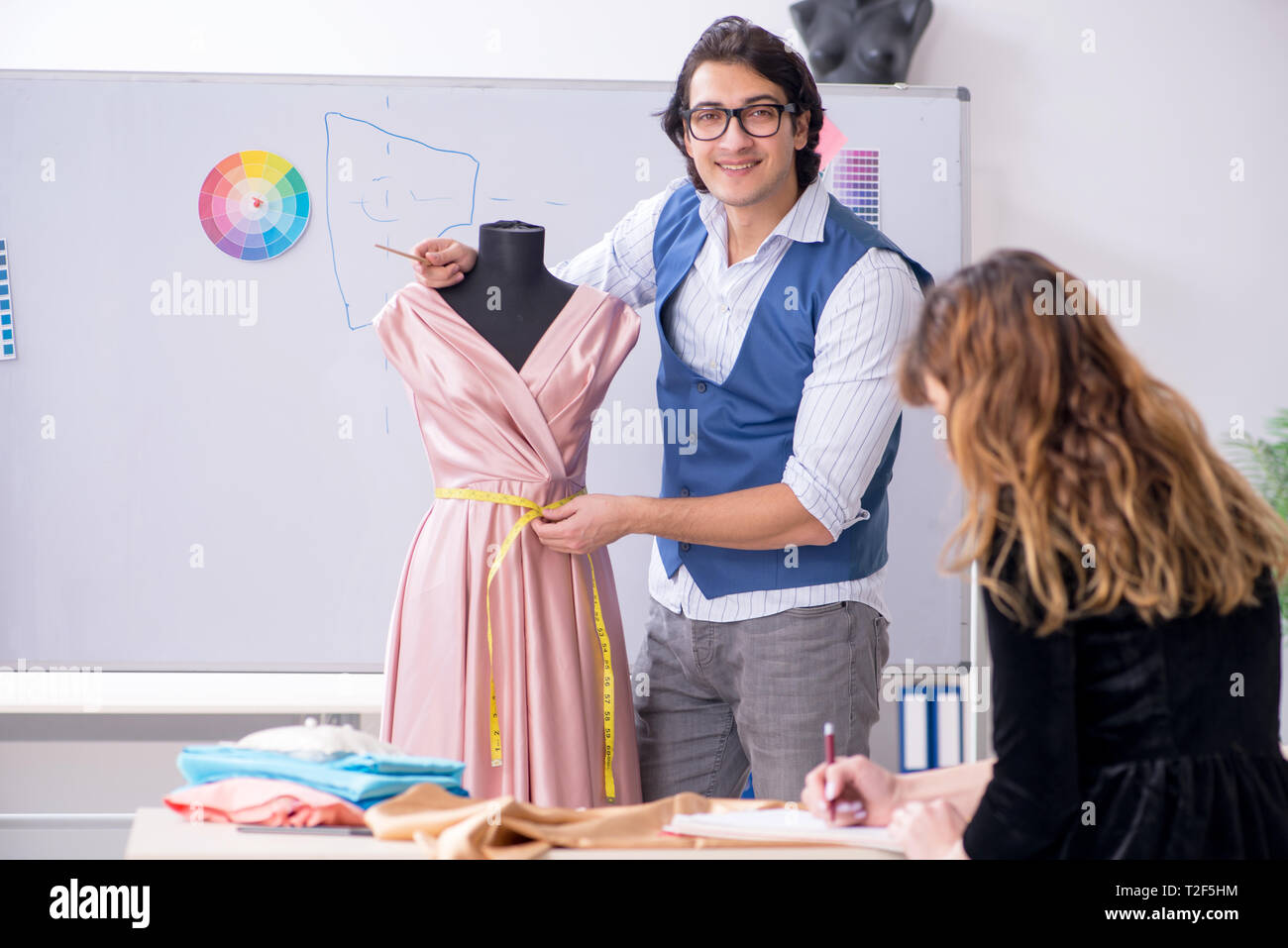 Young female teacher teaching figure hi-res stock photography and ...