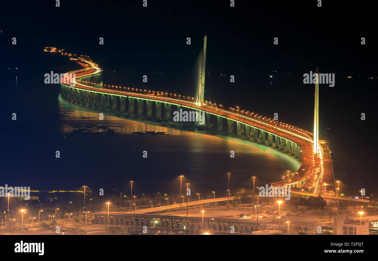 The landscape photo of night scene of the snake like bridge linking ...