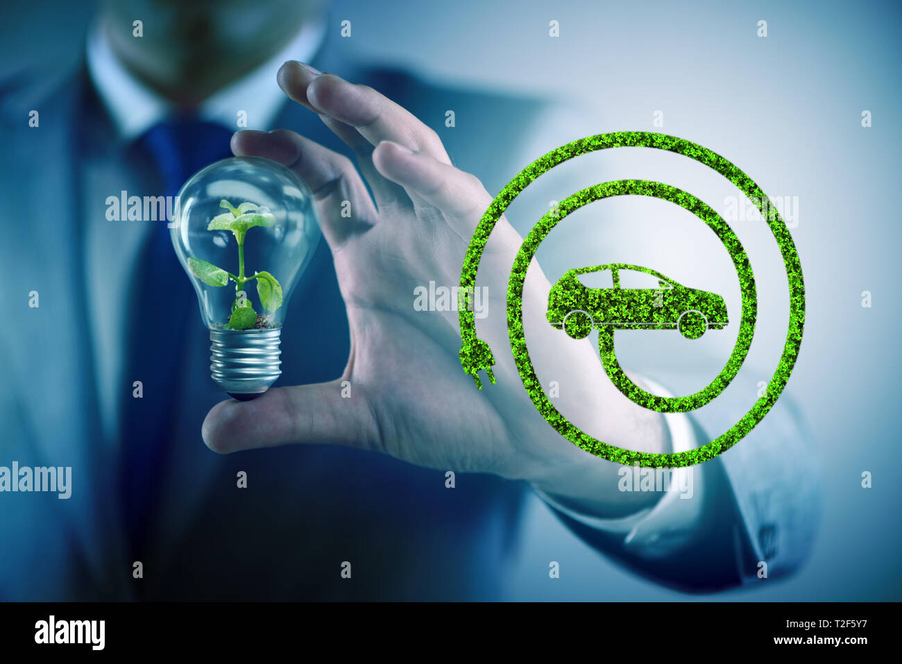 Electric vehicle concept with lightbulb Stock Photo - Alamy