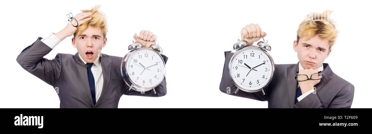 Young boy with alarm-clock in time management concept Stock Photo - Alamy