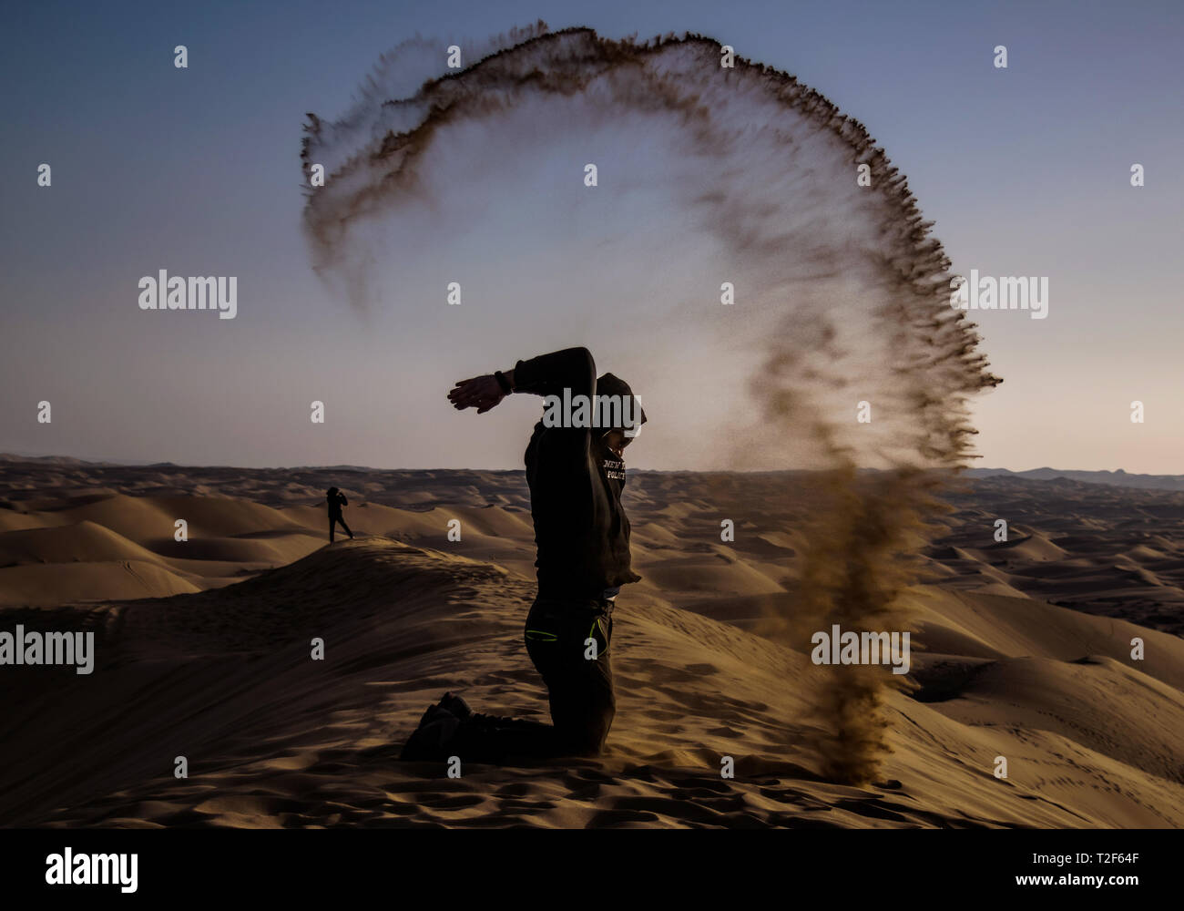 Sand splash in maranjab desert Stock Photo - Alamy