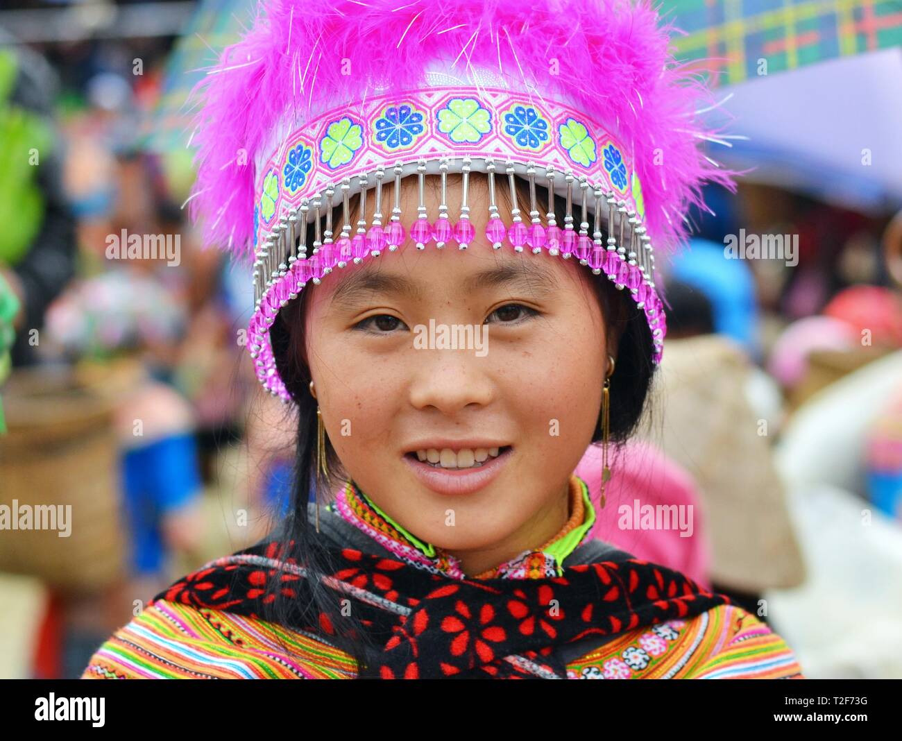 Young Vietnamese Flower H'mong woman wears the colourful traditional ... Young Vietnamese Flower H'mong woman wears the colourful traditional ...
